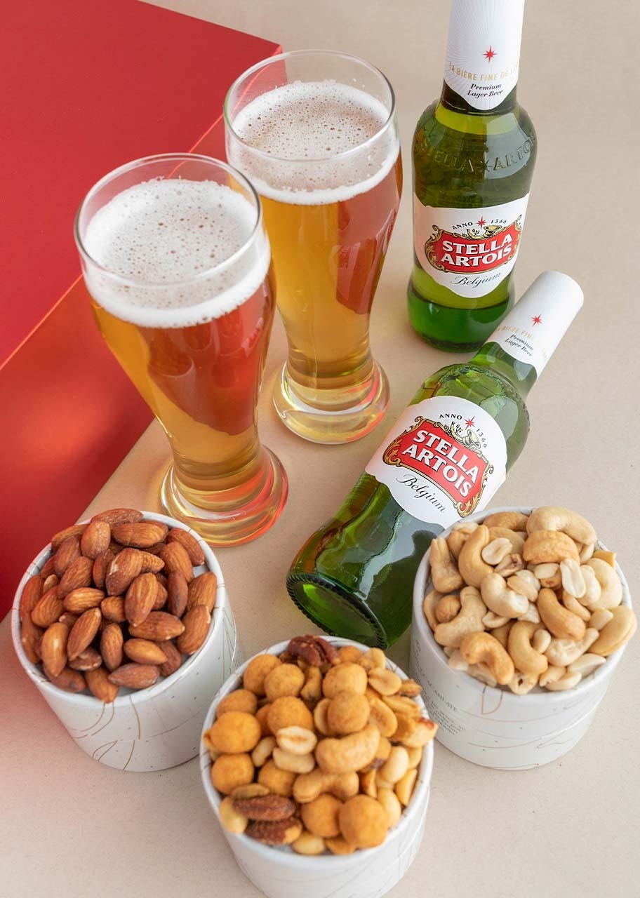Cerveza Stella con Botanas