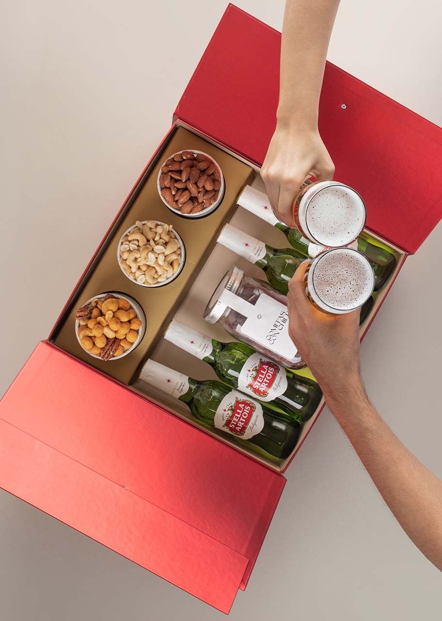 Cerveza Stella con Botanas
